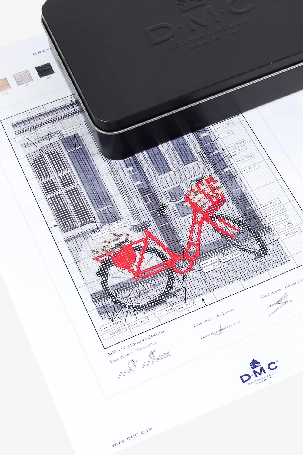 Metal box containing 24 skeins of Six Strand Embroidery Thread - DMC